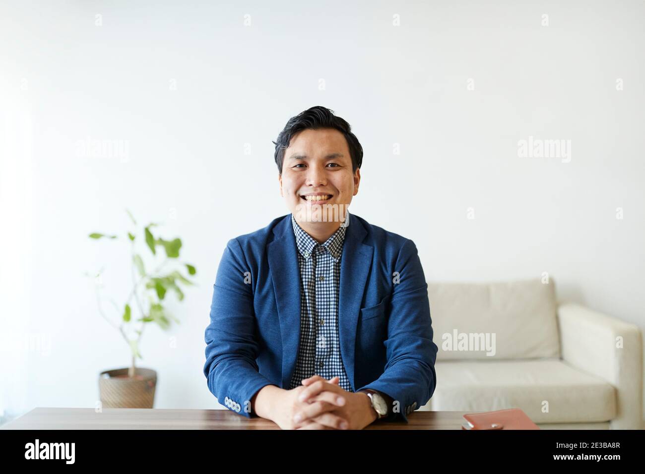 Young Japanese man having a remote video call Stock Photo - Alamy