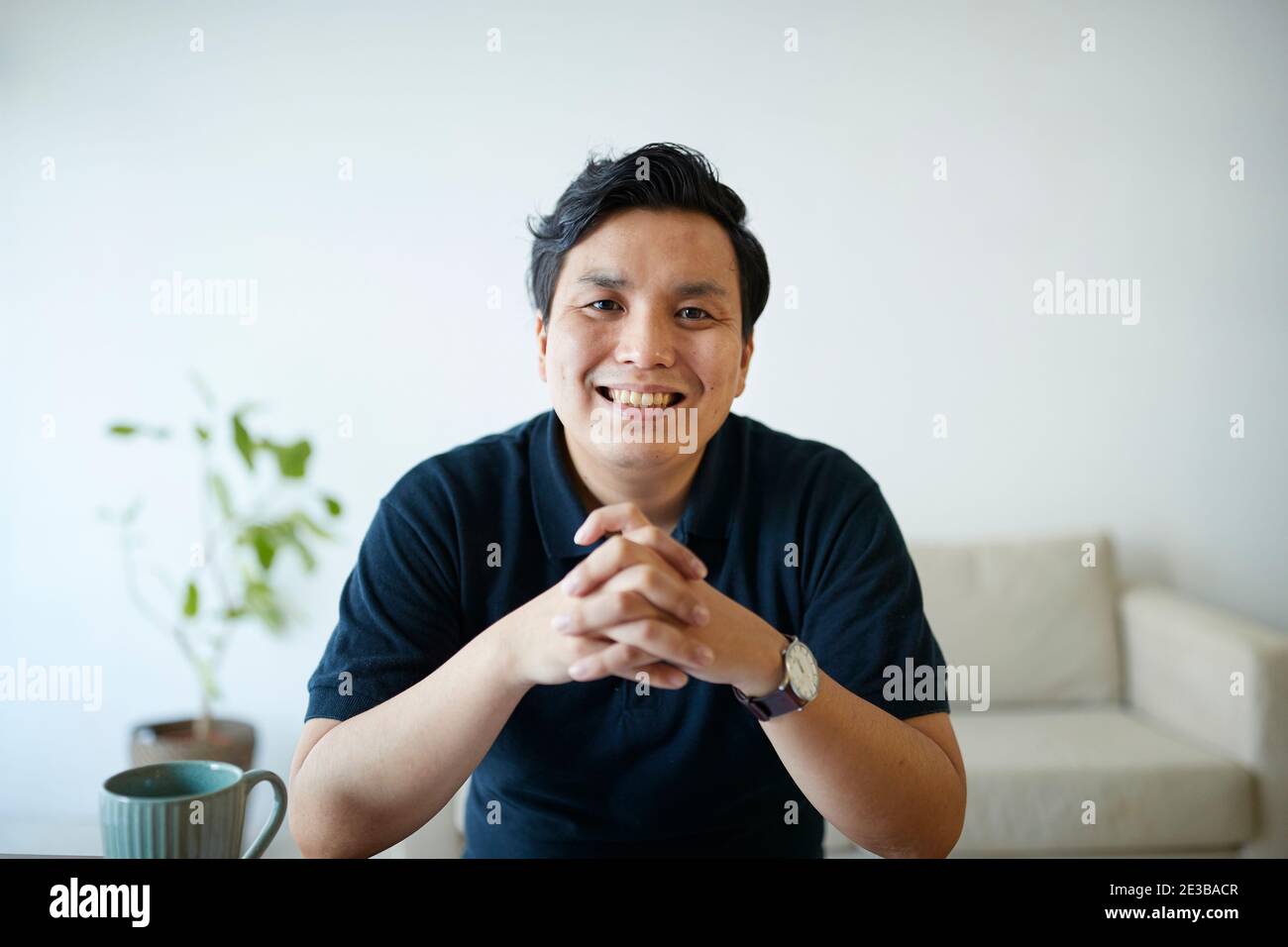 Young Japanese man having a remote video call Stock Photo - Alamy