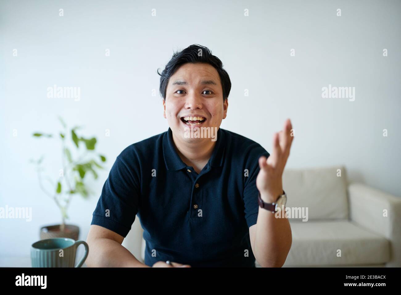 Young Japanese man having a remote video call Stock Photo - Alamy