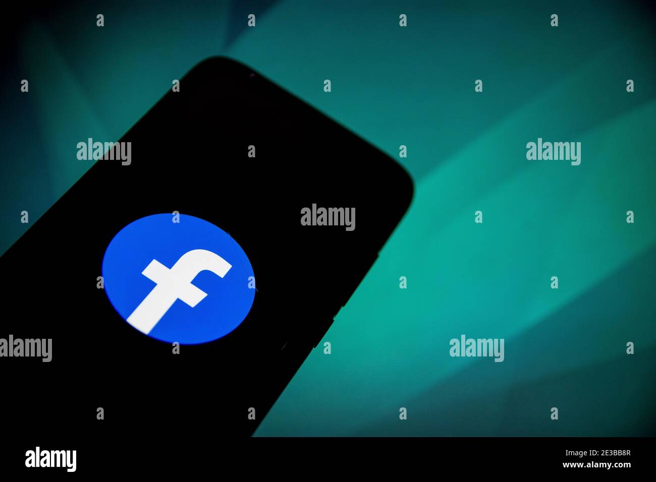 In this photo illustration Facebook logo seen displayed on a smartphone ...