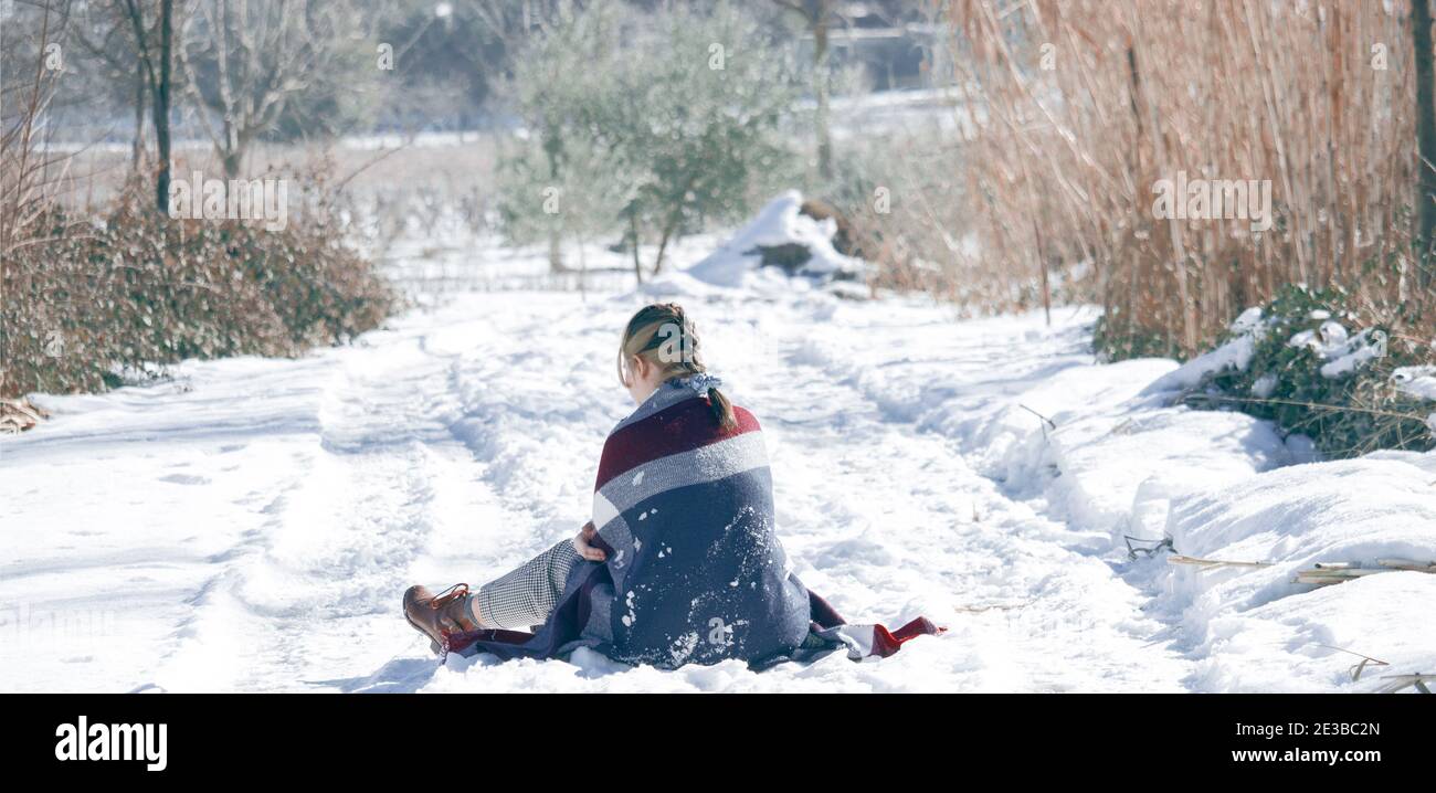 Panoramic picture of a girl's back with blonde hair that has a braid ...