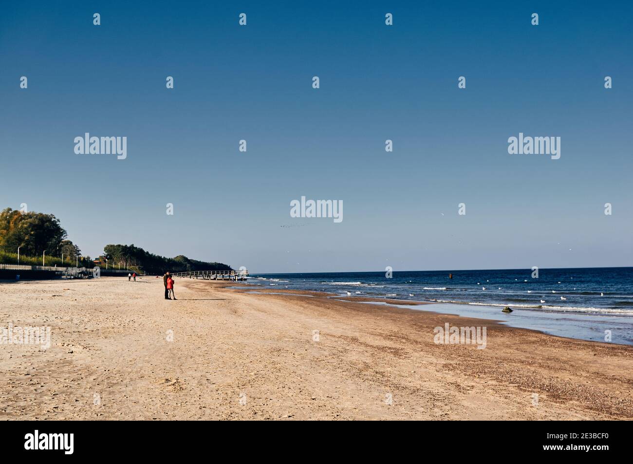 Beach in Sarbinowo, Poland under the clear blue sky Stock Photo - Alamy