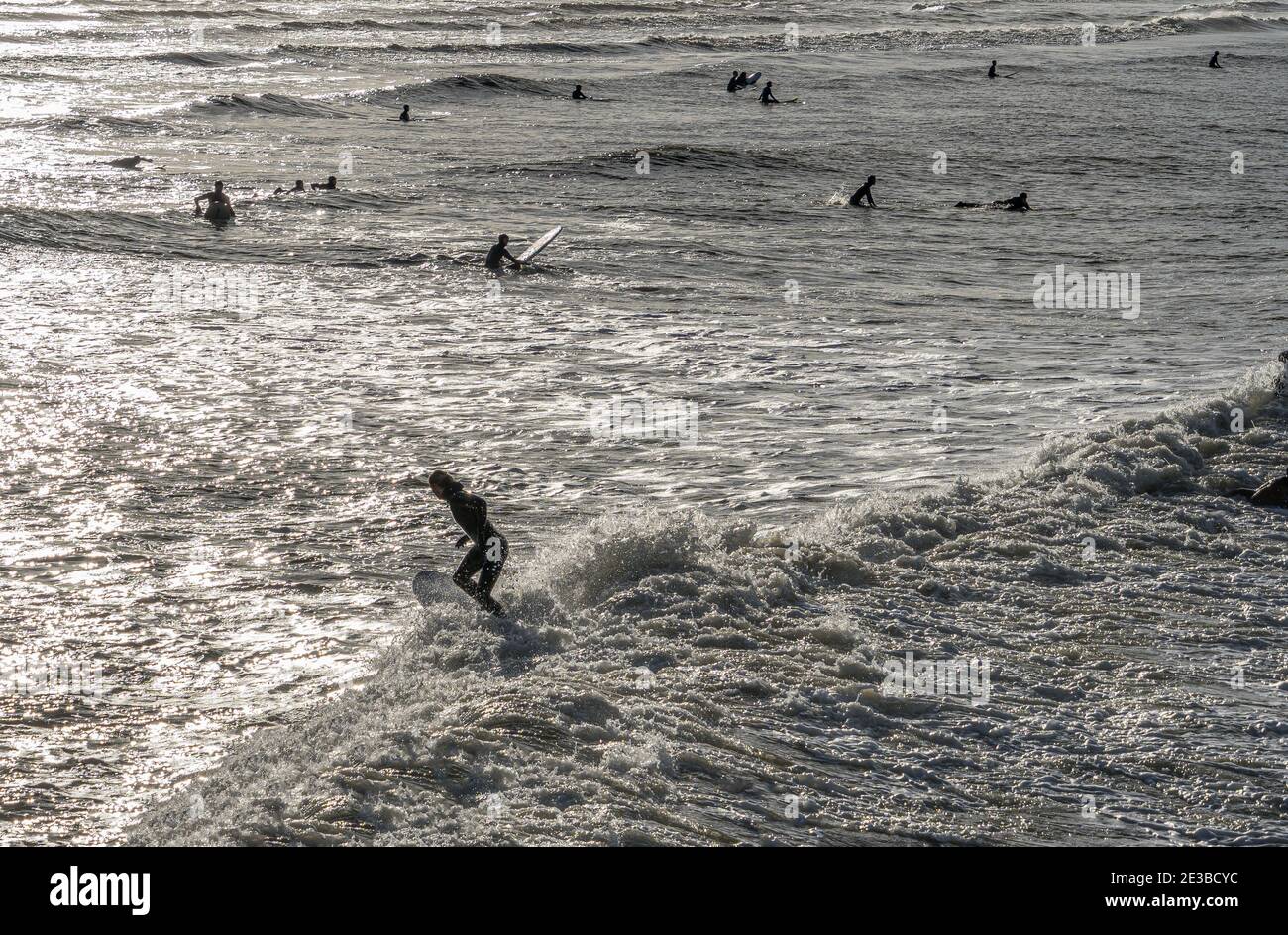 Surfers in the waves of Scheveningen beach #2 Stock Photo - Alamy