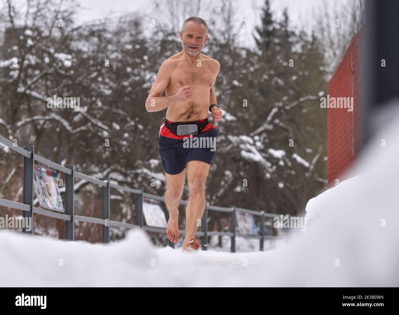 Barefoot snow hi-res stock photography and images - Alamy