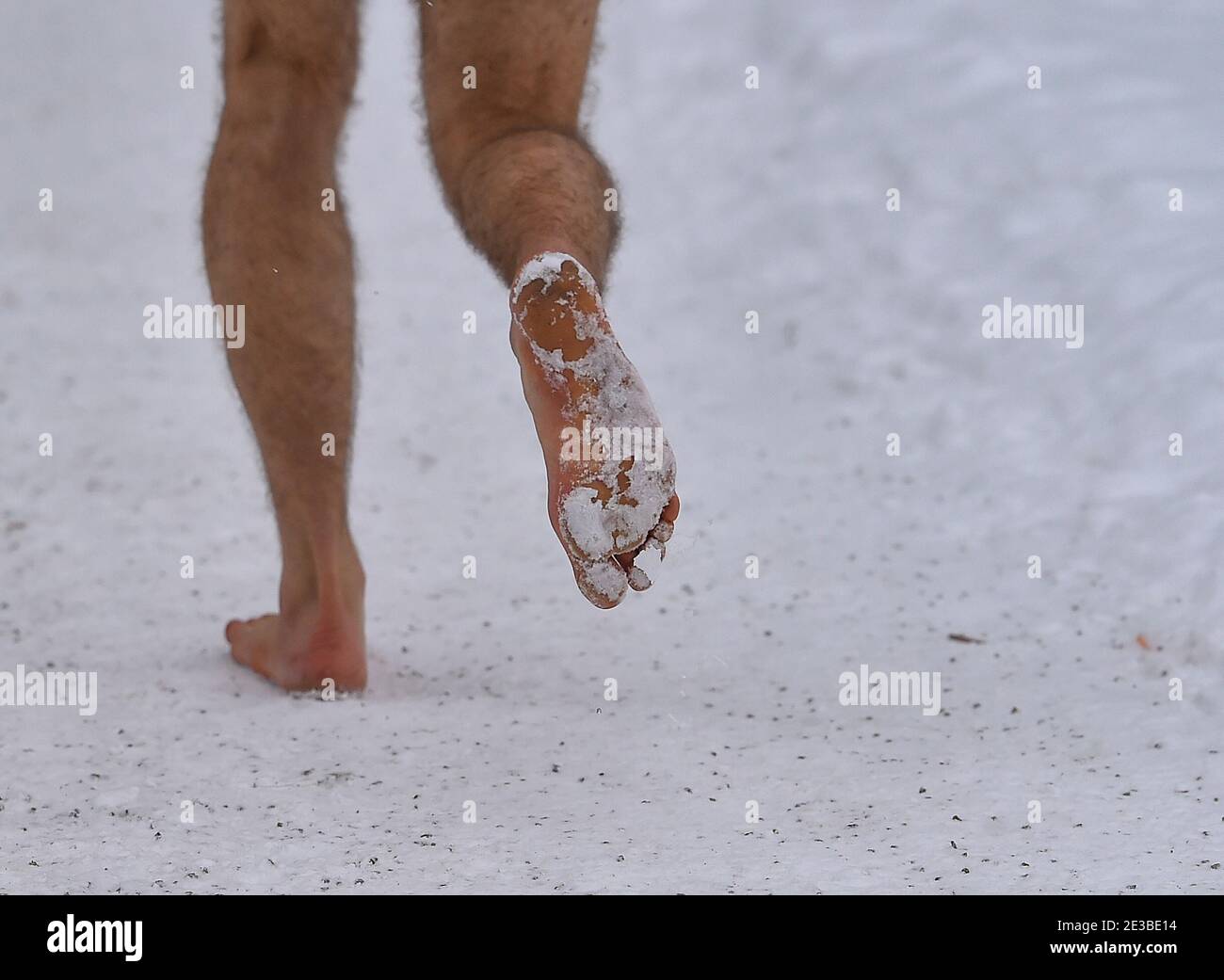 Barefoot snow hi-res stock photography and images - Alamy