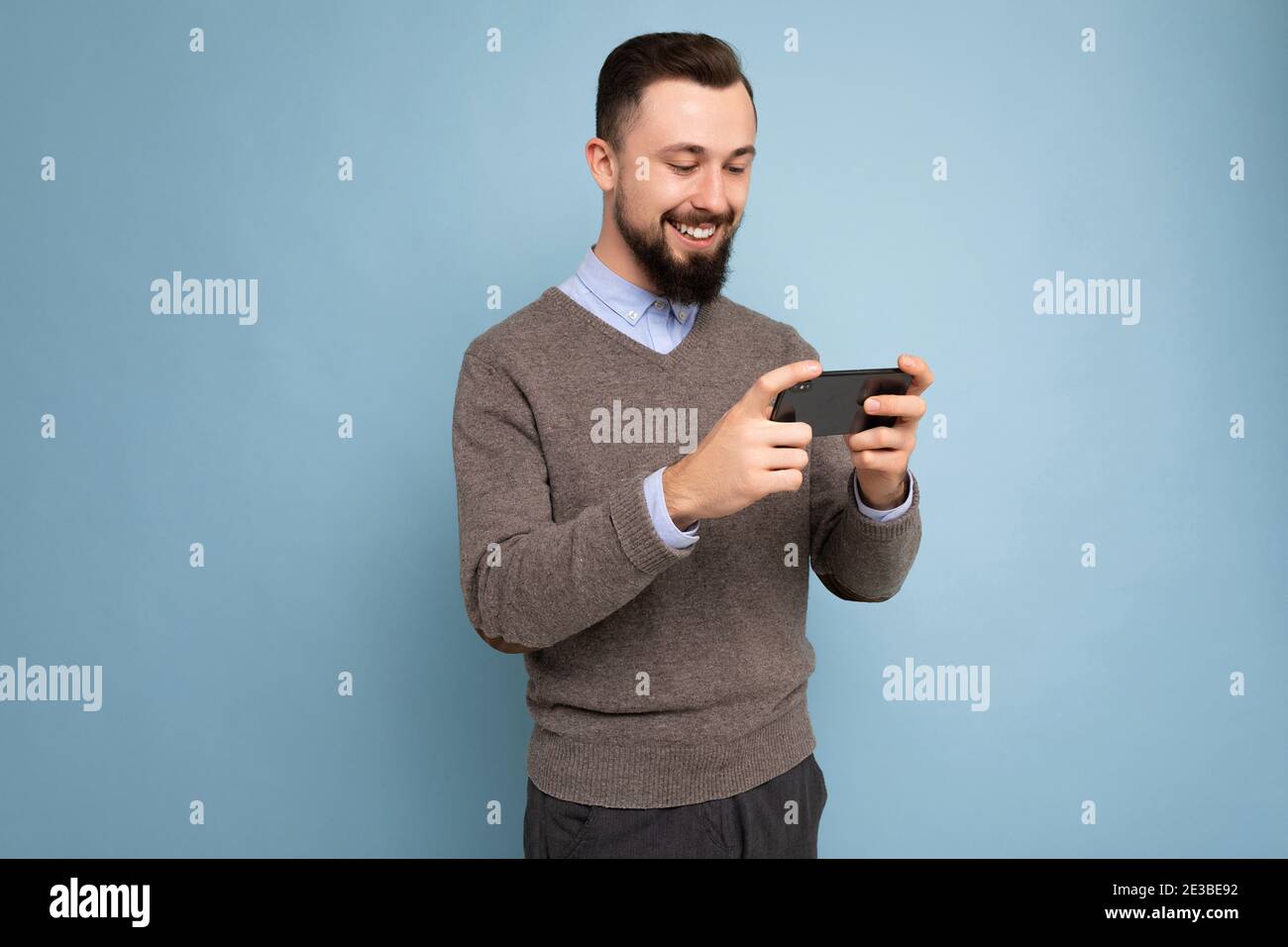 side-profile Photo shot of handsome positive good looking young man ...