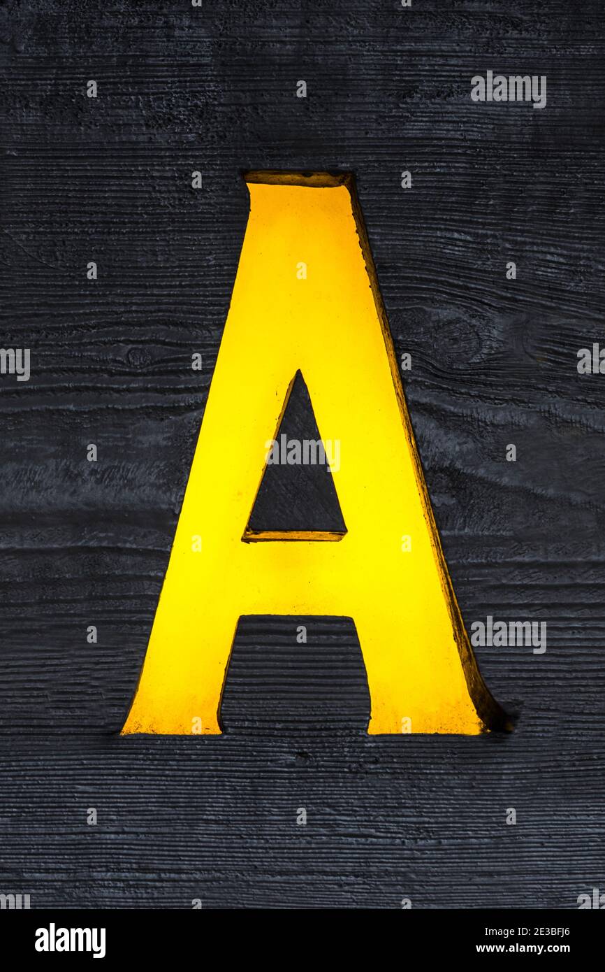 Yellow wooden letter a hi-res stock photography and images - Alamy