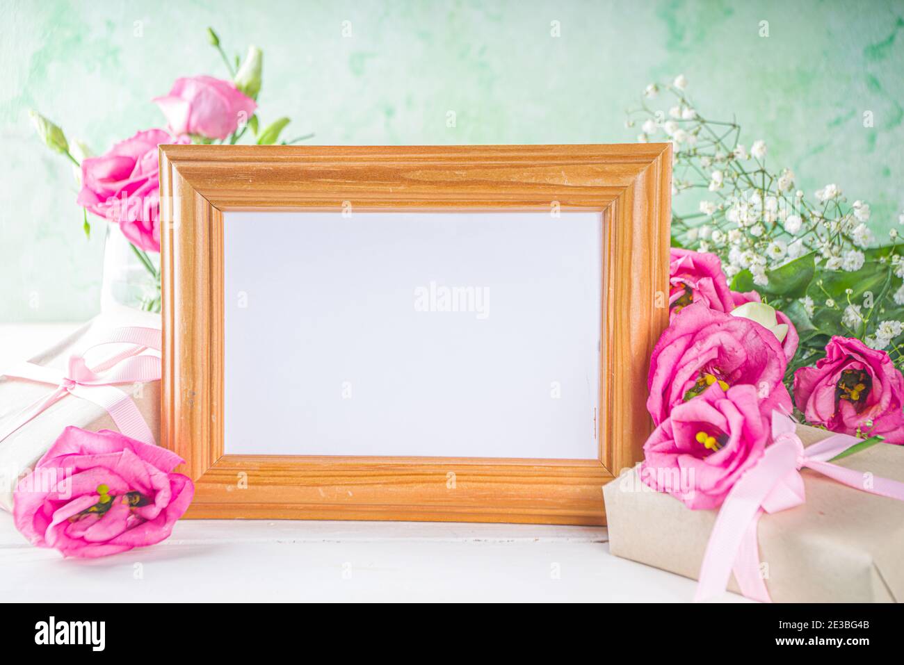 Beautiful spring flowers on white wooden background. Festive floral ...