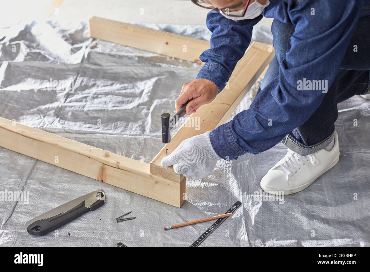 Japanese man doing DIY Stock Photo - Alamy