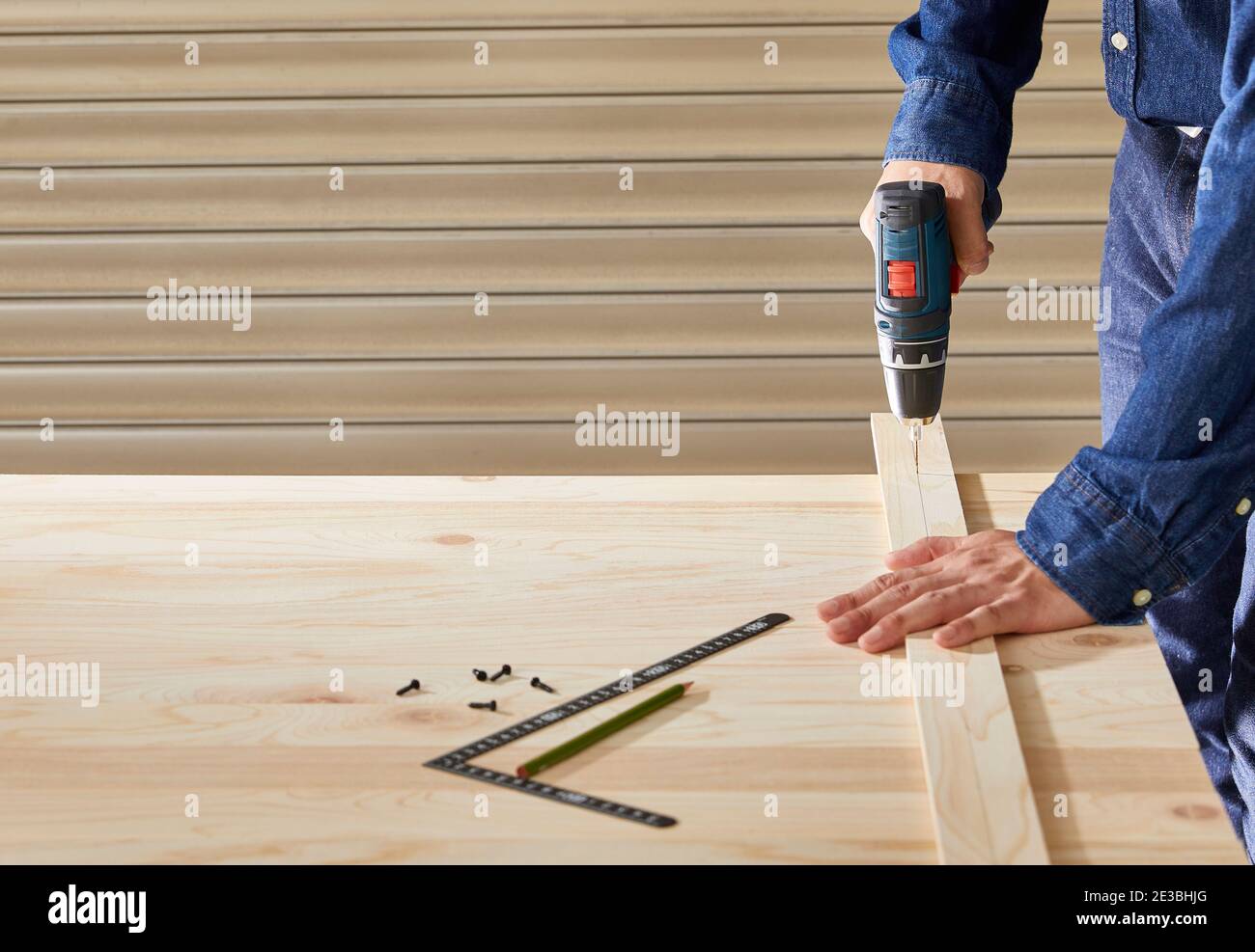 Japanese man doing DIY Stock Photo - Alamy