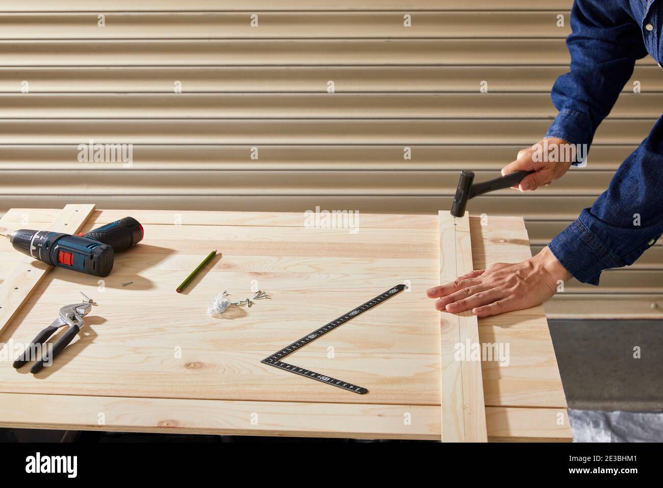 Japanese man doing DIY Stock Photo - Alamy