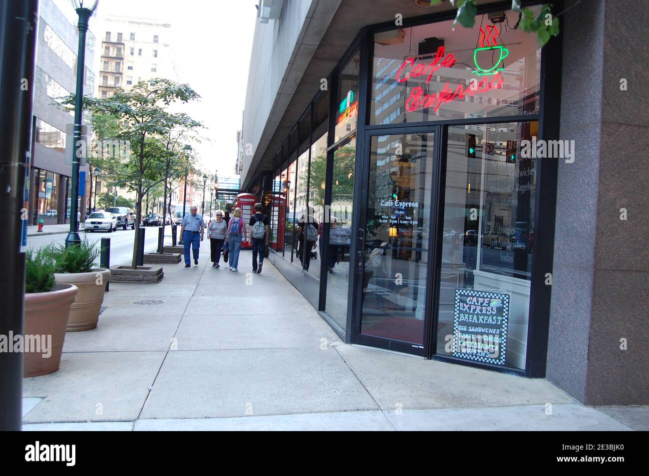 Philadelphia USA Cafe Express plant pots walking side walk back pack ...