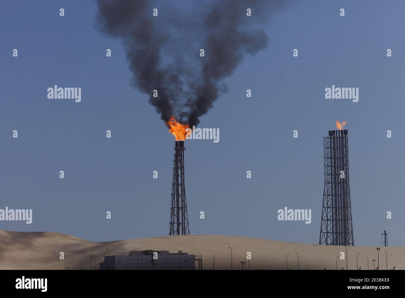 Flare stack and dense black smoke in the industrial plant Stock Photo ...