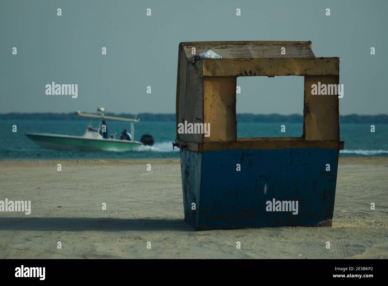Closeup of an old rubbish bin abandoned on the beach, Qatar Stock Photo ...