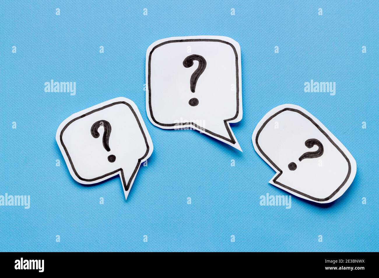 Question mark on paper bubbles, top view. Question concept Stock Photo ...