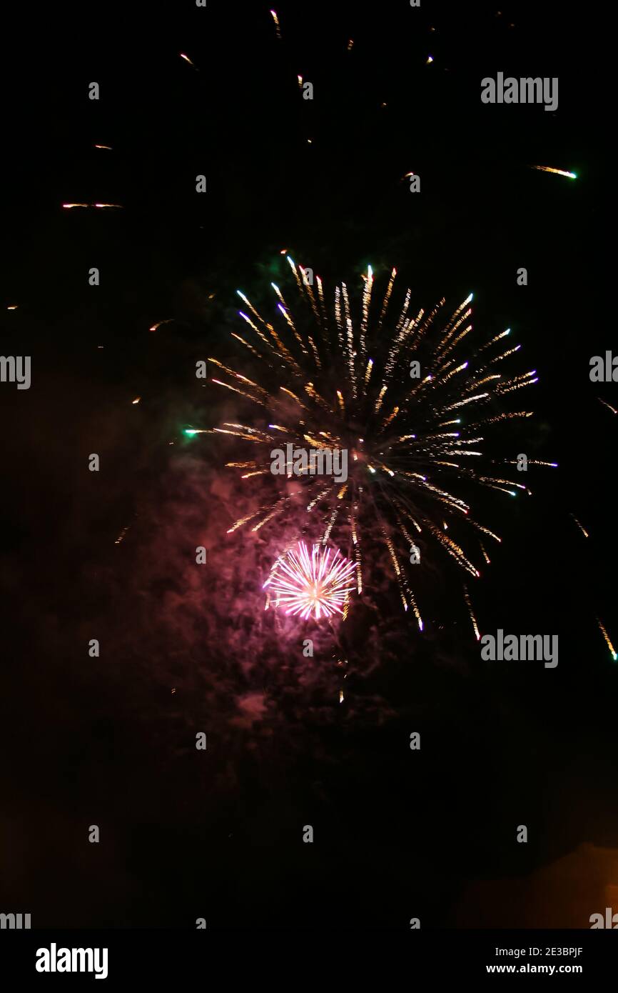 Colorful fireworks set on the dark black nite sky background Stock ...