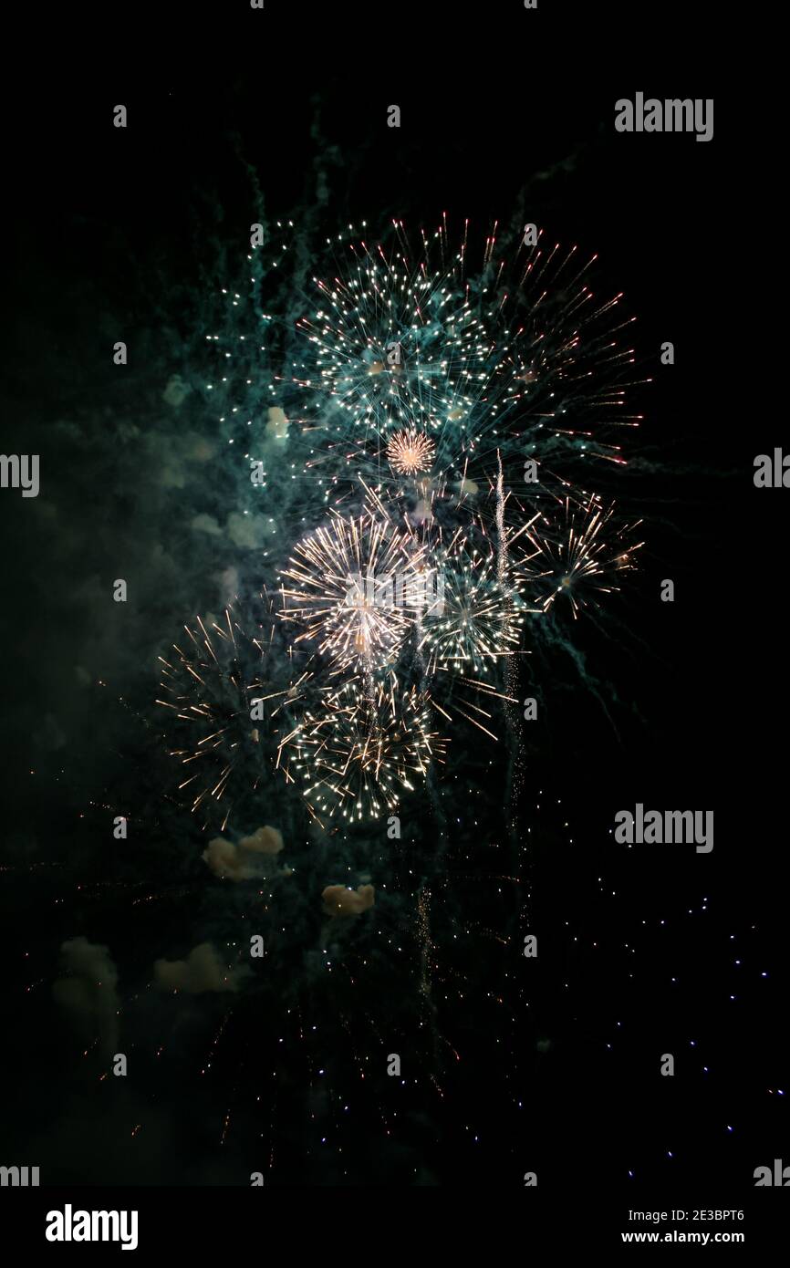 Colorful fireworks set on the dark black nite sky background Stock ...