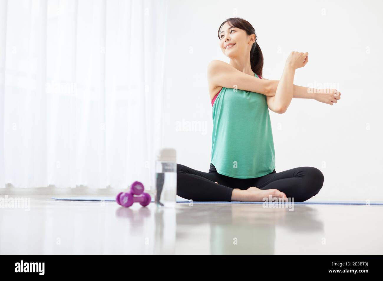 Healthy Japanese woman training at home Stock Photo - Alamy