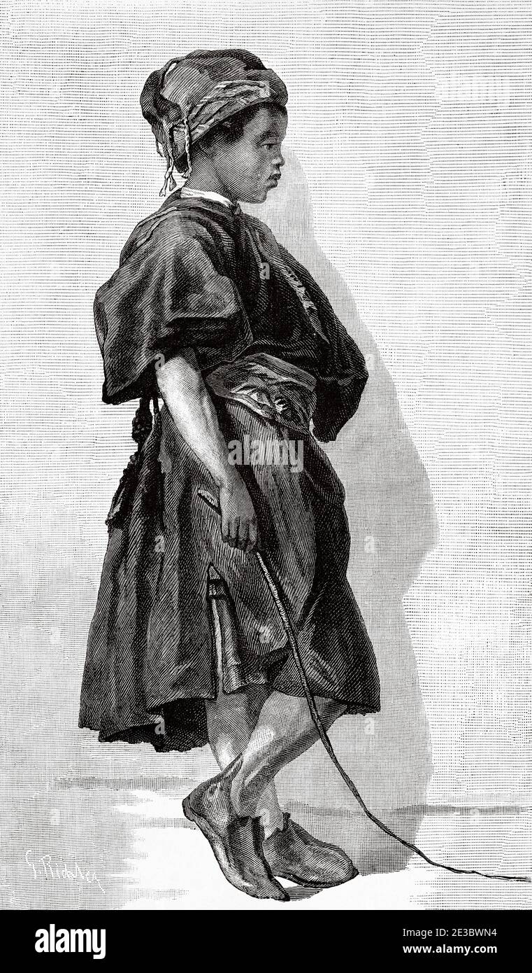 Young Egyptian camel driver dressed in typical clothing, Ancient Egypt. Old 19th century ...