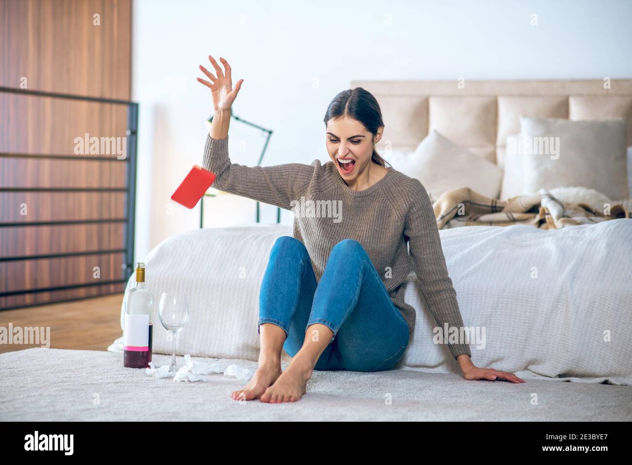 Stressed woman drinking hi-res stock photography and images - Alamy