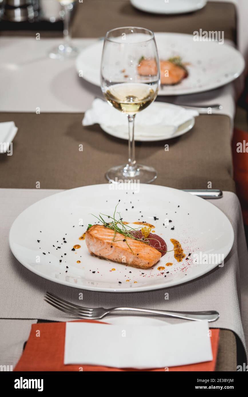 delicious salmon in a restaurant. small portion Stock Photo - Alamy
