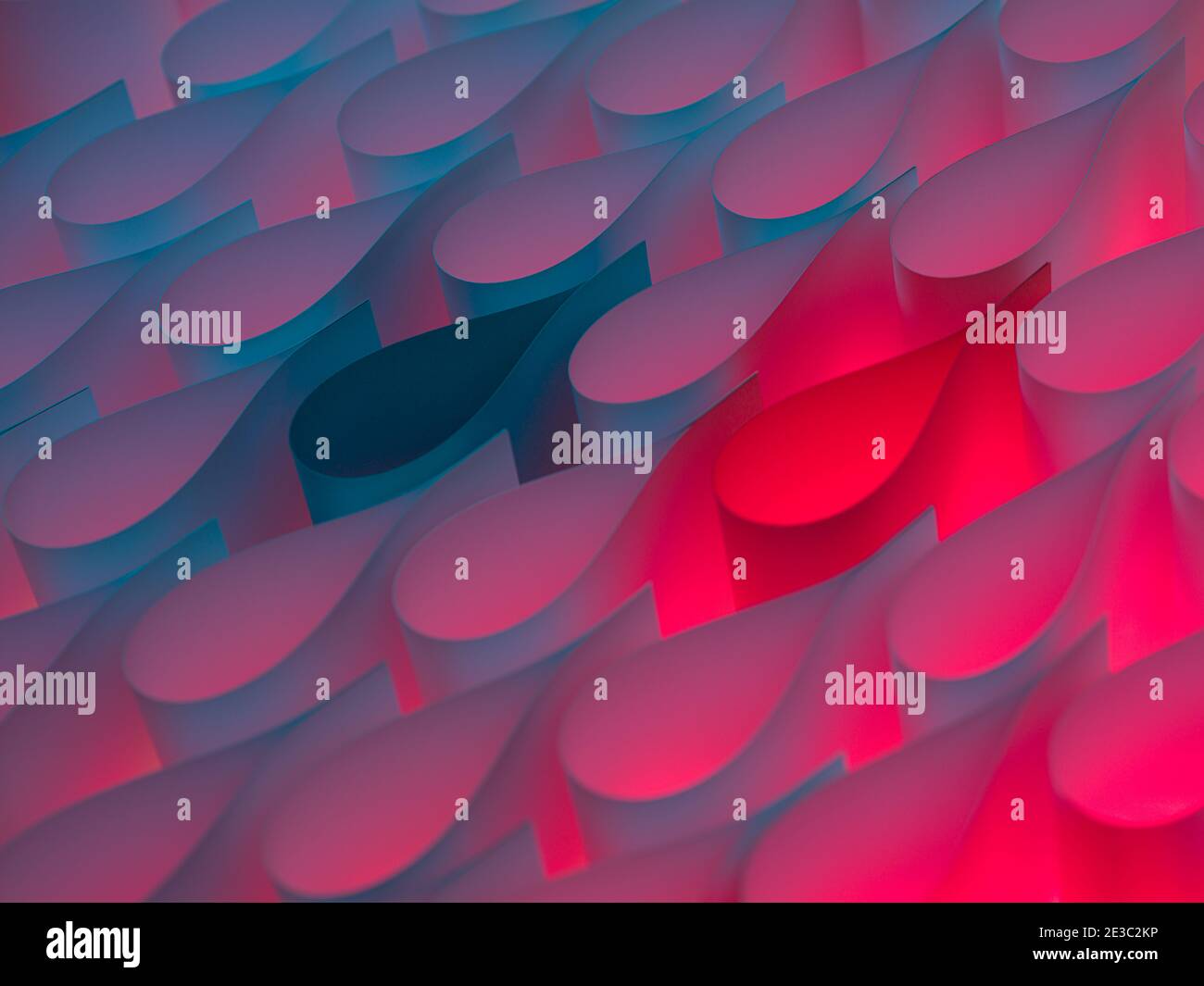 Underneath illuminated white drops of paper with blue and red filter ...