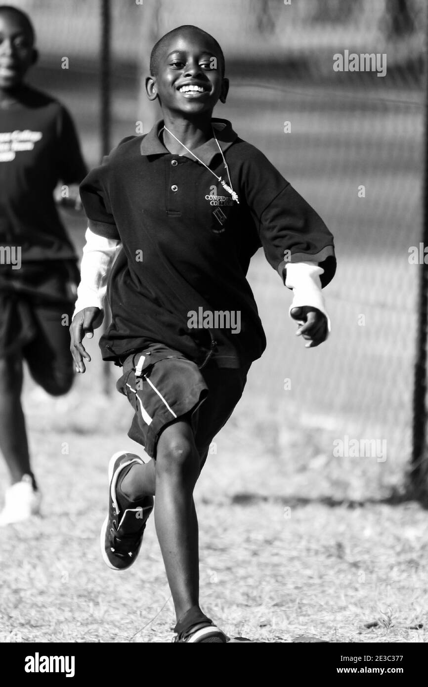 Boy stretch exercise Black and White Stock Photos & Images - Alamy