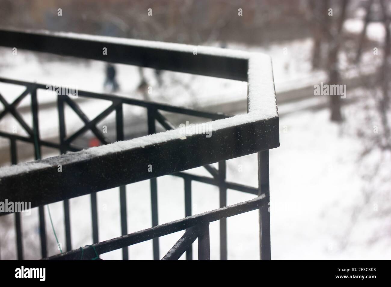 Balcony railings in apartment in high-rise building, view of the city ...