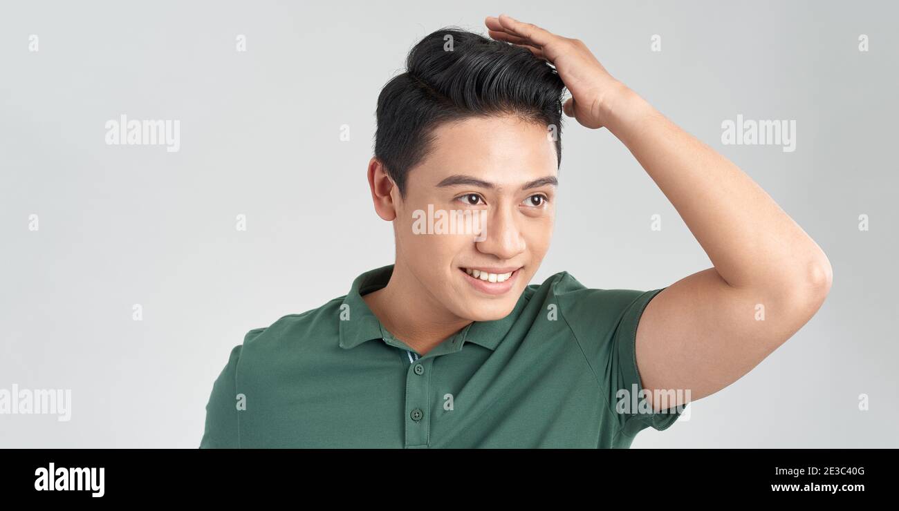 isolated of a man setting his hair Stock Photo - Alamy