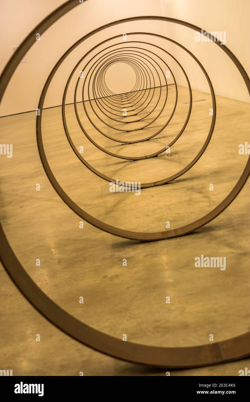 28 rolled steel rings, each one engraved with a distance in kilometres ...