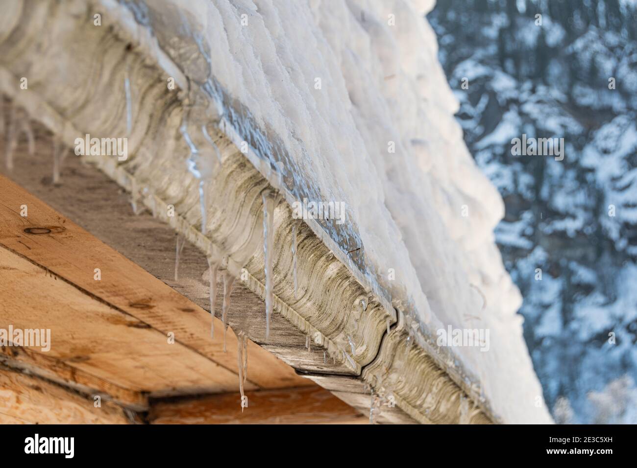 Frozen roof under snow in winter weather Stock Photo - Alamy