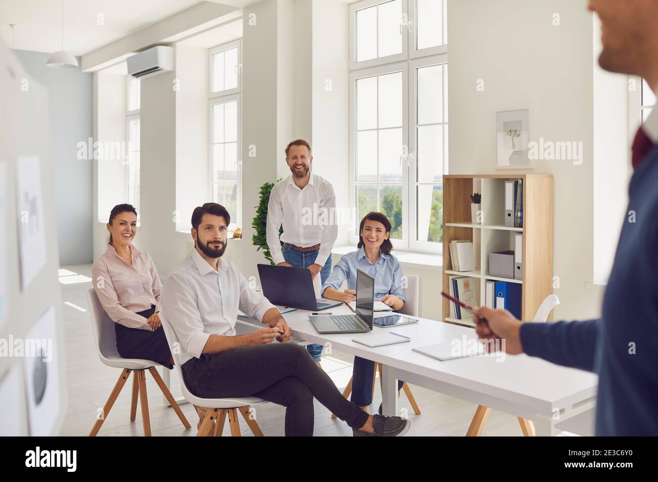 Men discussing presentation hi-res stock photography and images - Alamy