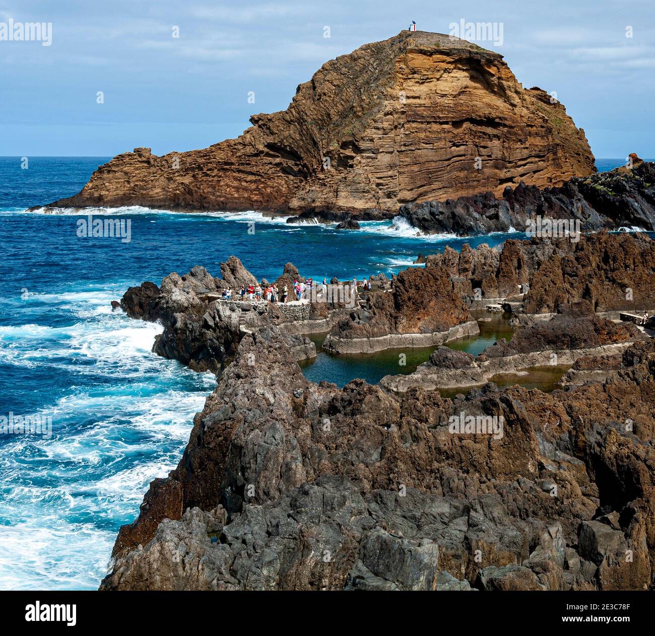 Madeira Portugal. Tourists visiting the lava pools in the coastal ...
