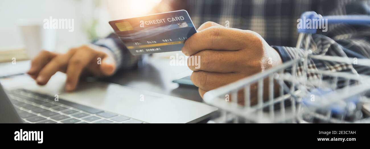 shopping online, shop and pay by credit card, business man enter code ...