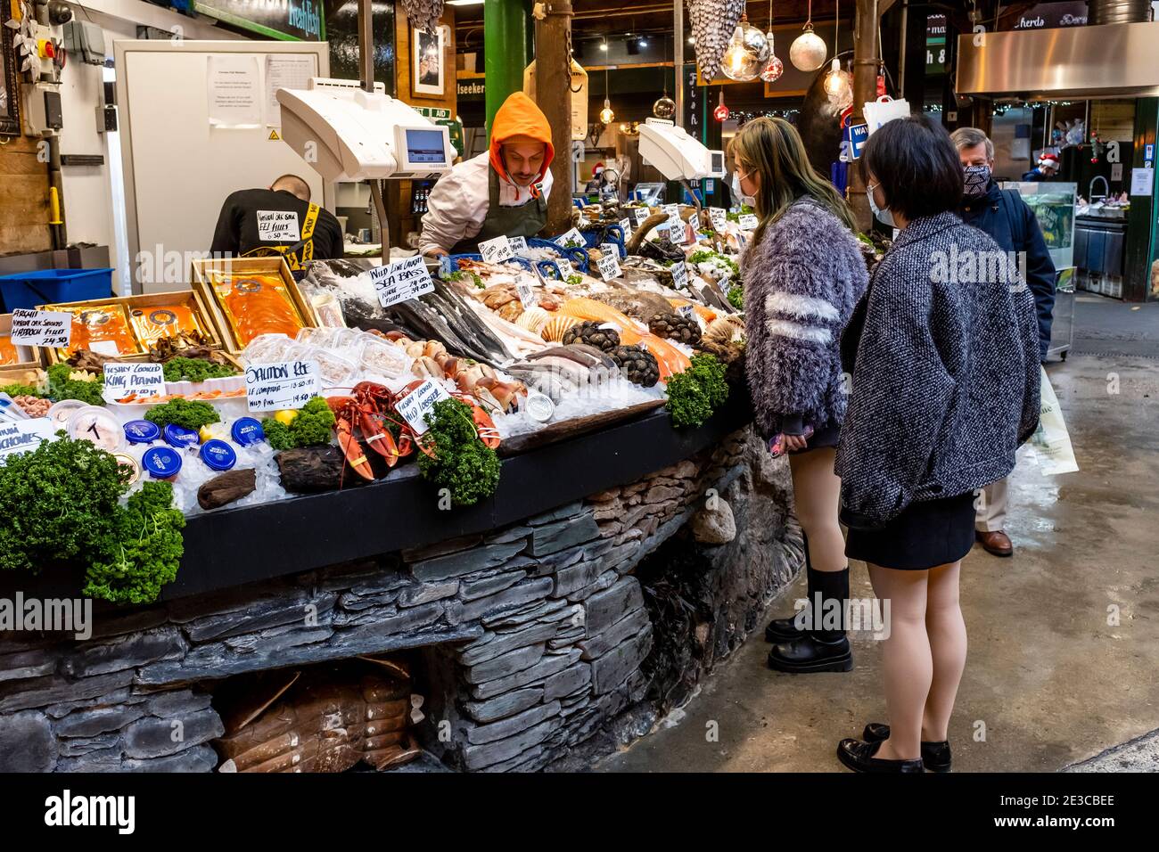 Young Asian Women Buying Seafood At Borough Market, London, UK Stock ...