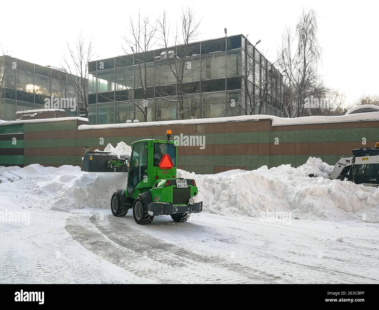 Bobcat snow removal hi-res stock photography and images - Alamy