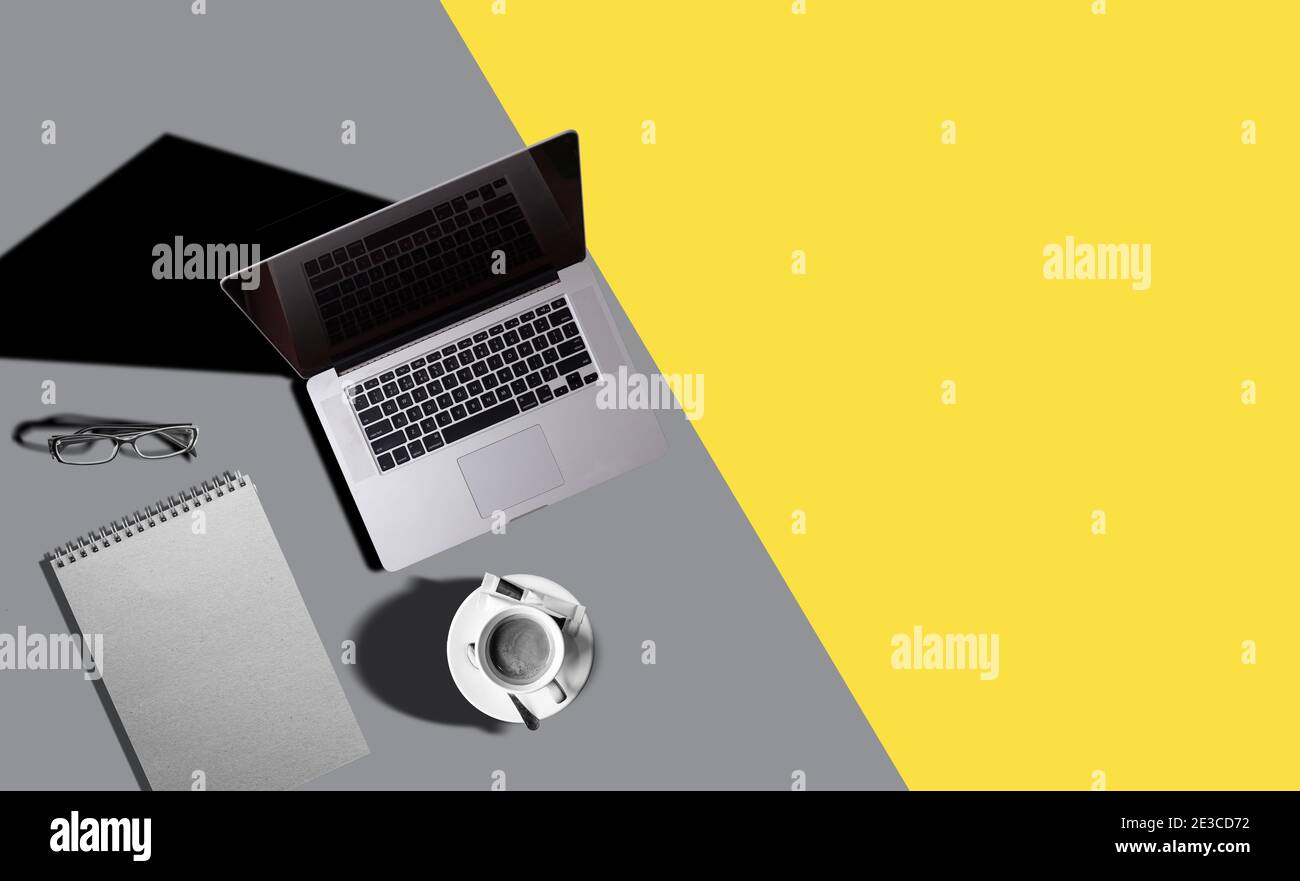 Designer desk top view with computer, graphic tablet color palette ...