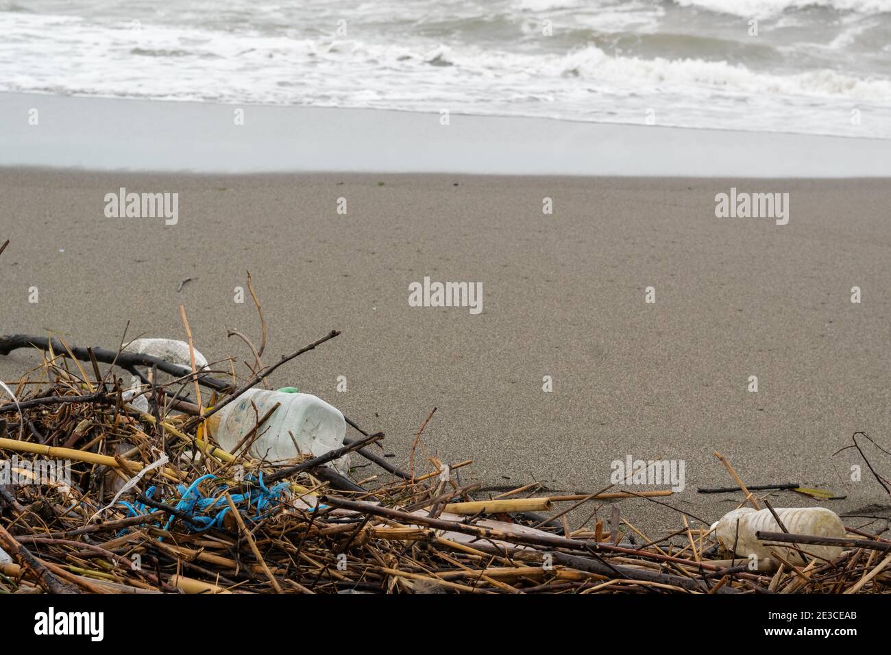 Trash thrown away in the beach, environmental problems. Natural ...