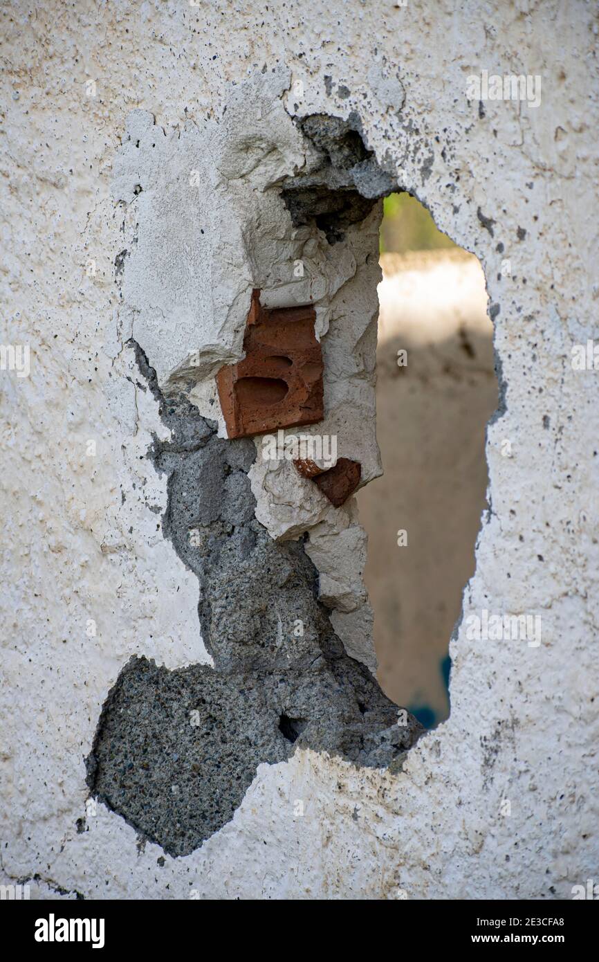 Hole in the wall 2 Stock Photo - Alamy