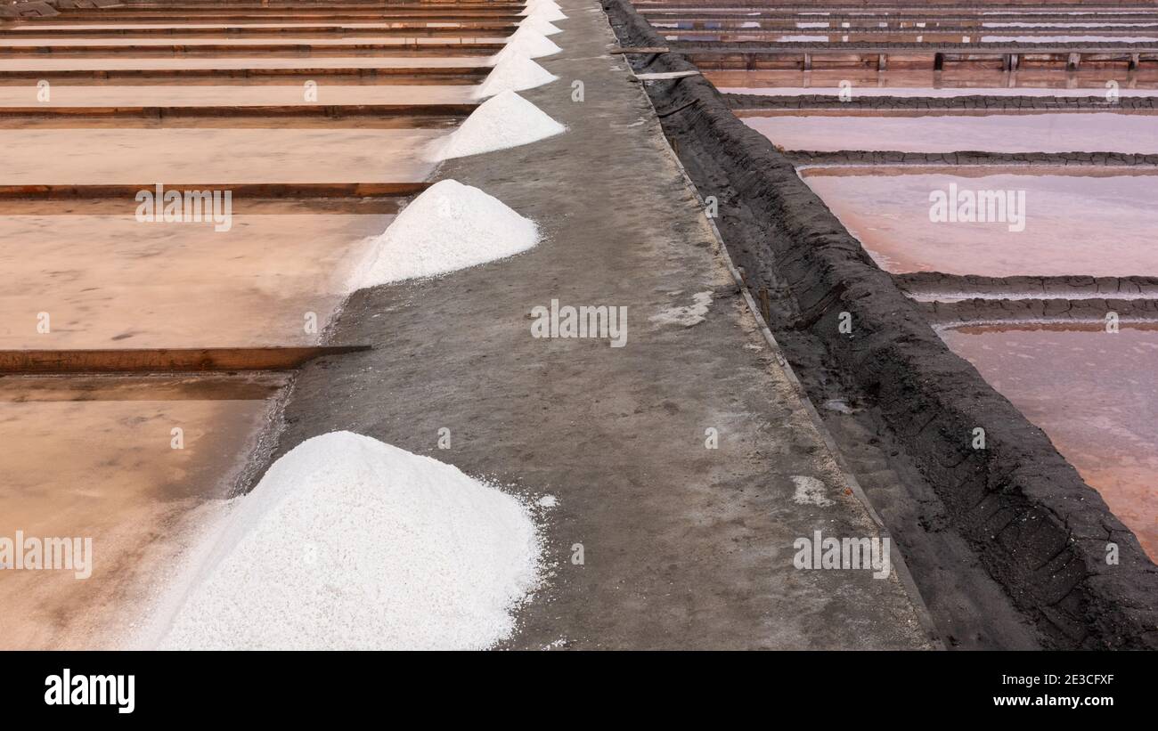 Different types of salt in salt pans with salt harvesting pools Stock ...