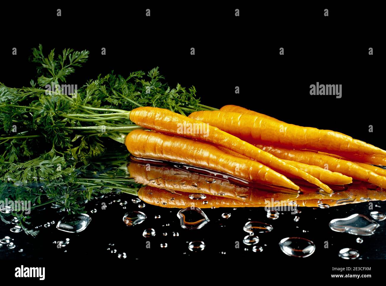 A studio still life of carrots Stock Photo - Alamy