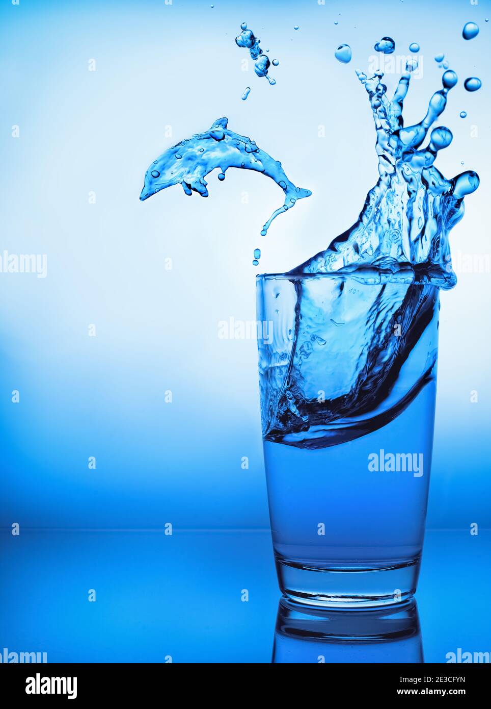 glass of water. splash of water. dolphin figure out of the water Stock ...