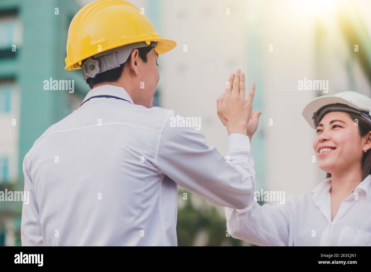 Two people are success business outdoor Stock Photo - Alamy