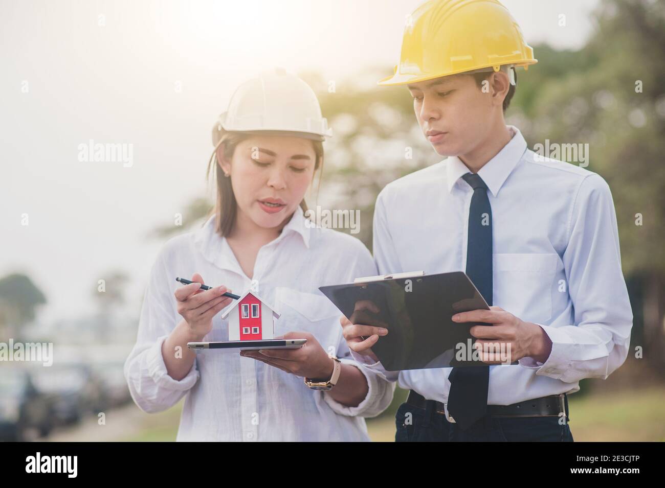 Two people worker talking on site house building construction Stock ...