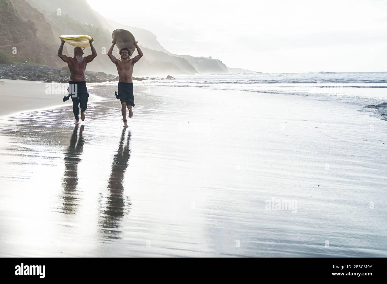 Family running in out ocean hi-res stock photography and images - Alamy