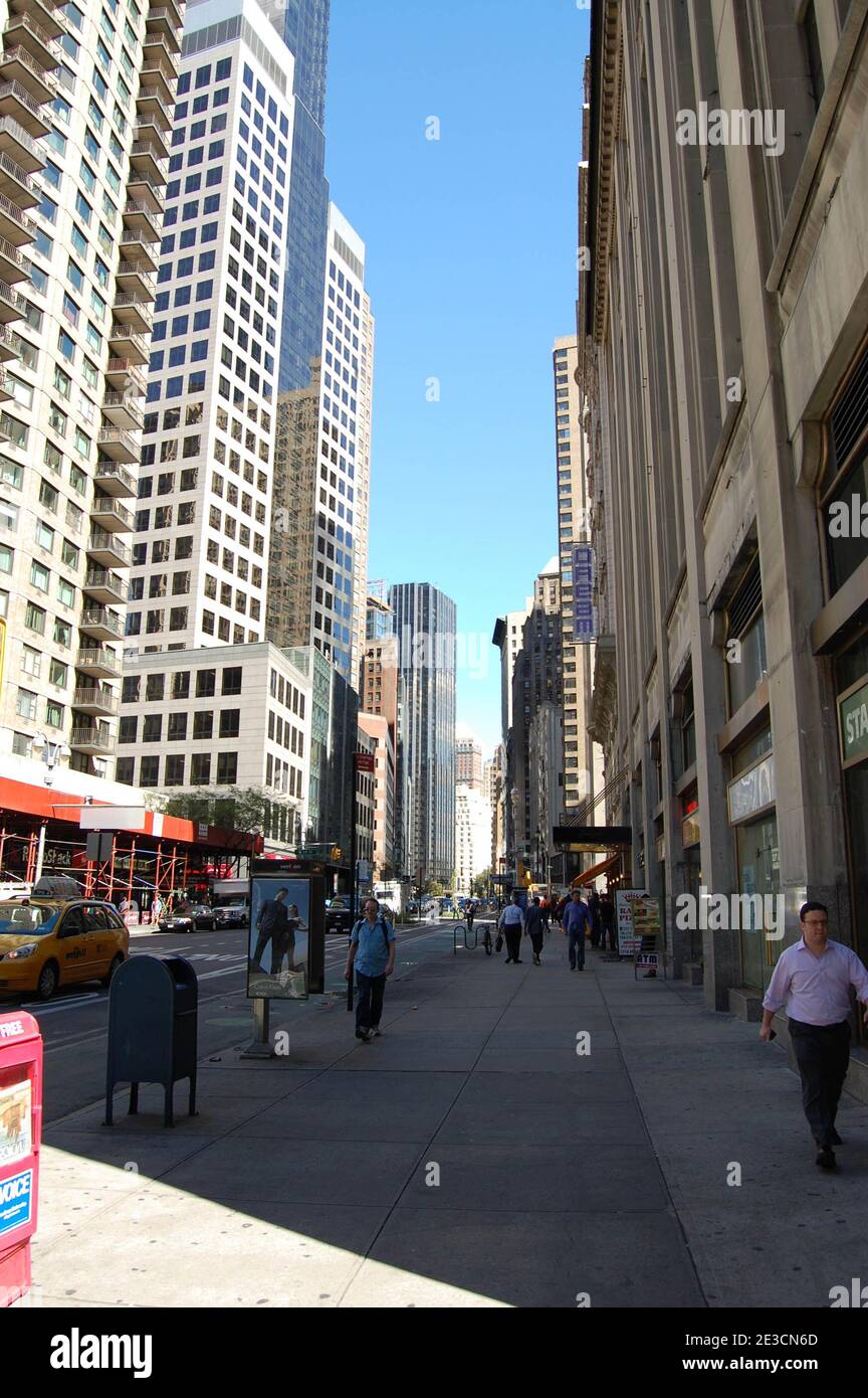 Skyscrapers in New York USA walking along the pavement path high rise ...