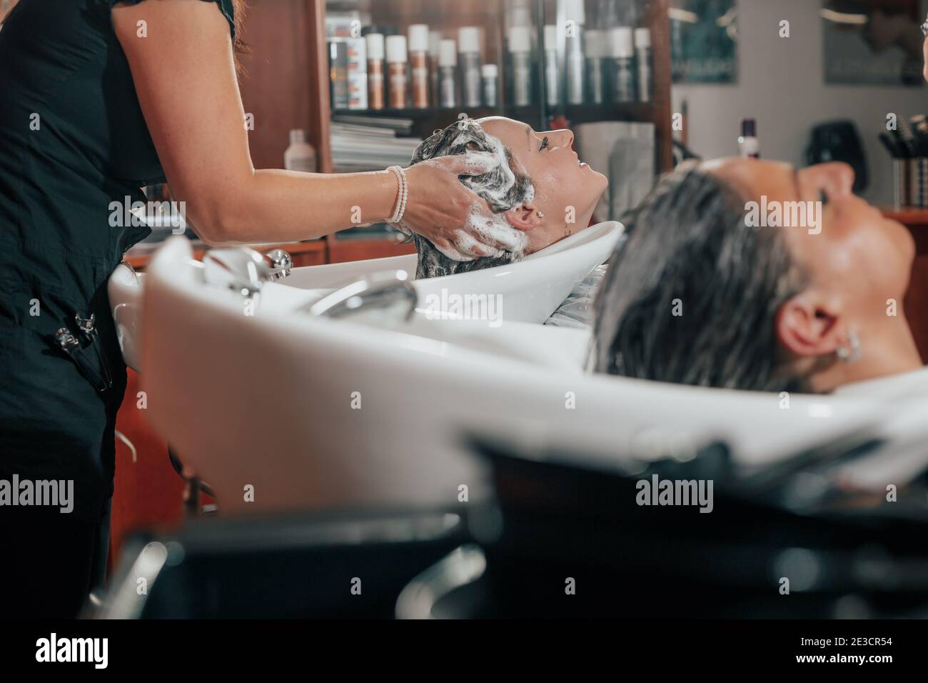 Beautiful brunette enjoying massage hi-res stock photography and images ...