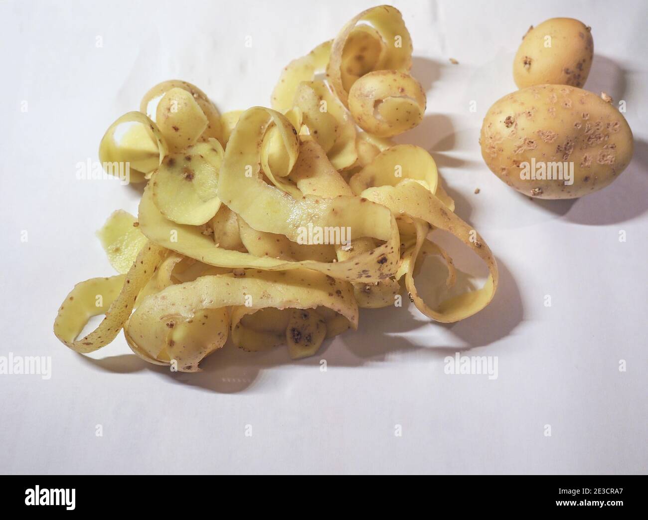 Pealing potatoes hi-res stock photography and images - Alamy