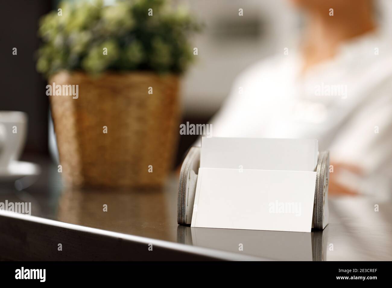 Close up of modern hotel reception counter desk Stock Photo - Alamy