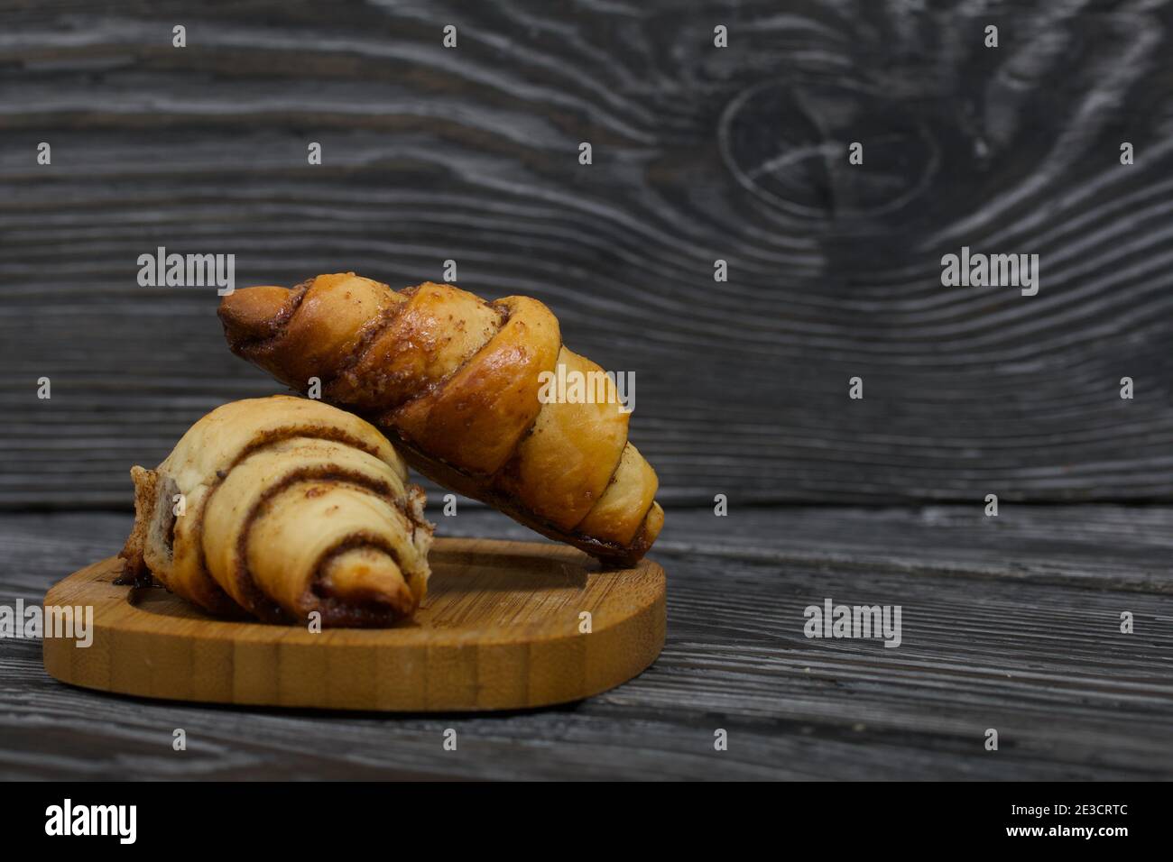 Cinnamon croissants. Rich pastries. Close-up shot Stock Photo - Alamy